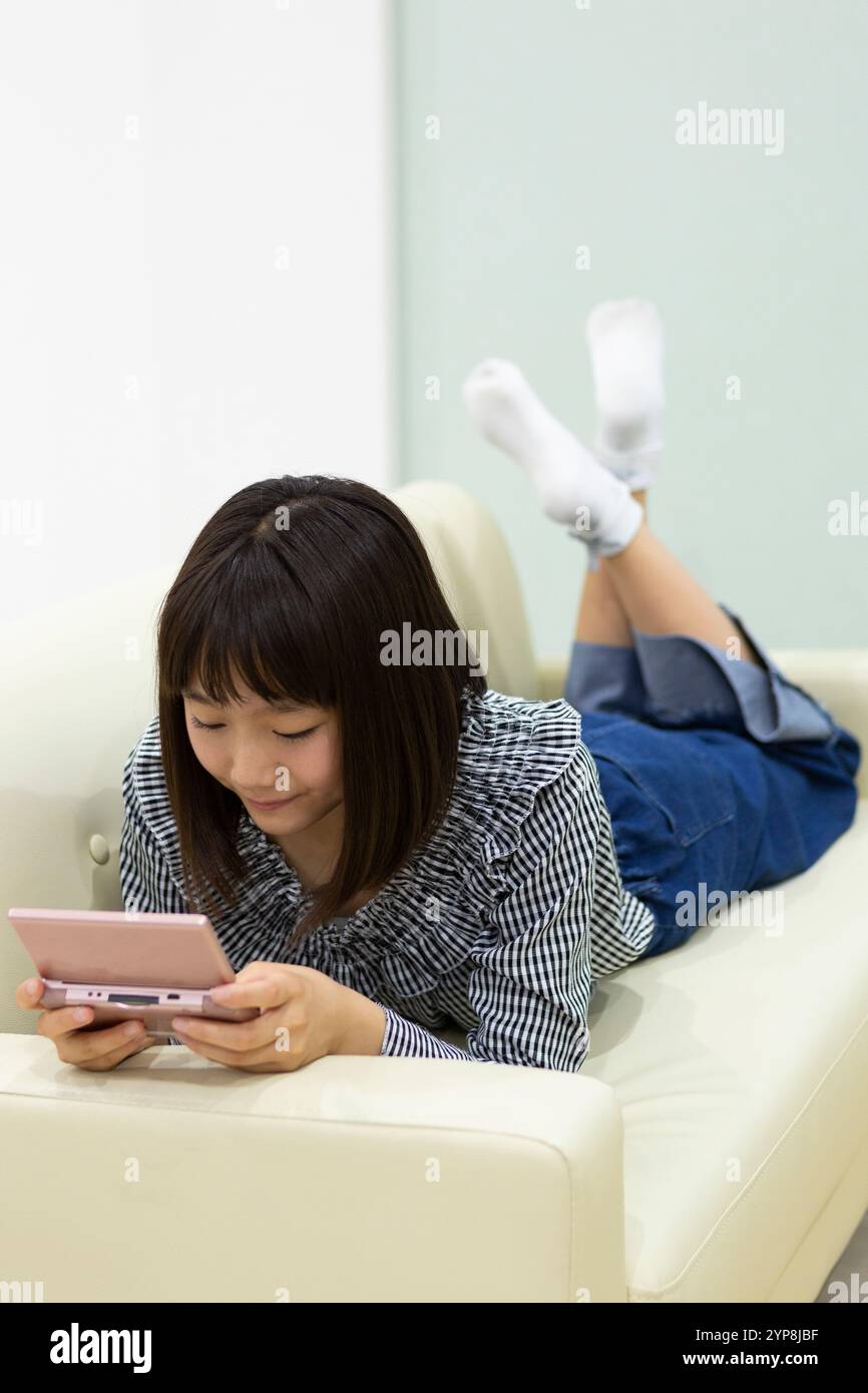 Junior high school students playing games Stock Photo - Alamy