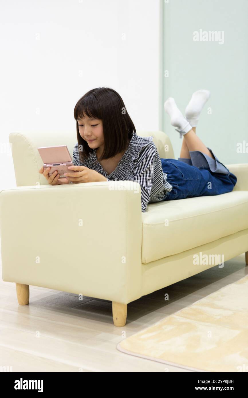Junior high school students playing games Stock Photo - Alamy