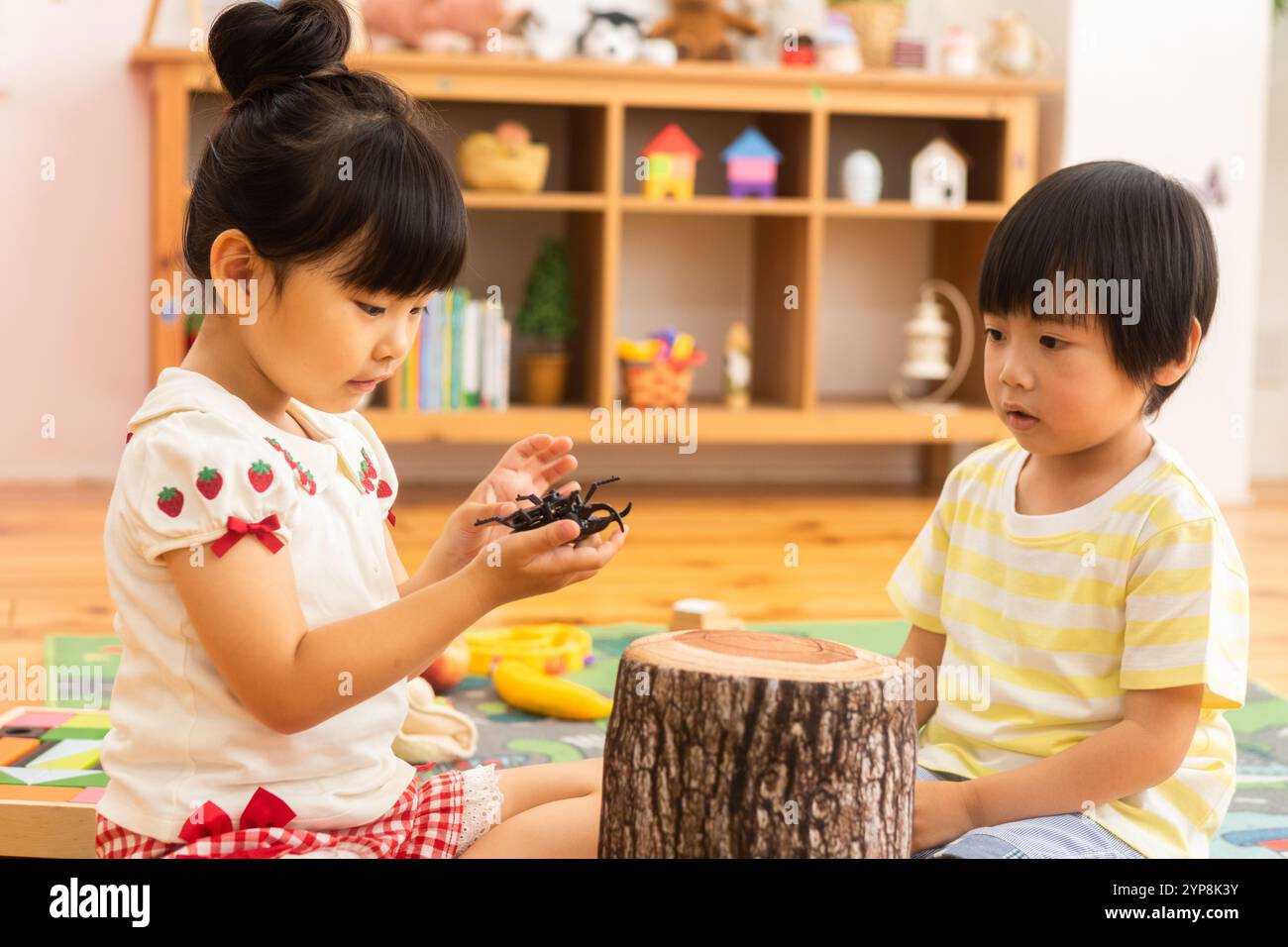 Children playing with toys Stock Photo - Alamy