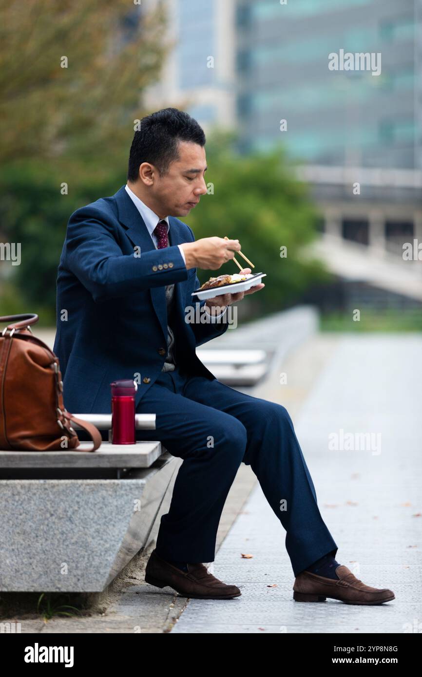 Businessman 50 eat hi-res stock photography and images - Alamy