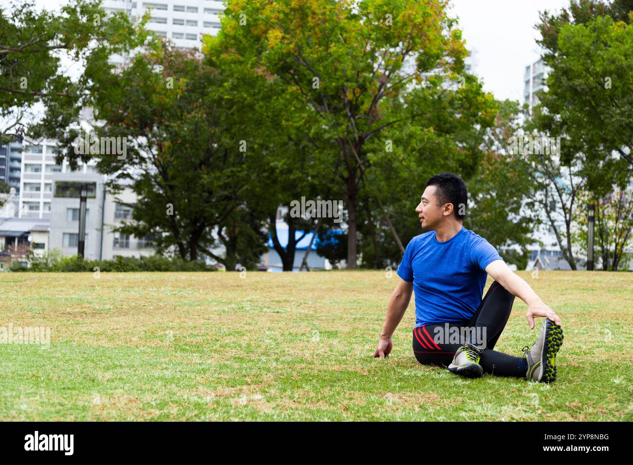 Middle men doing preparatory exercises Stock Photo - Alamy