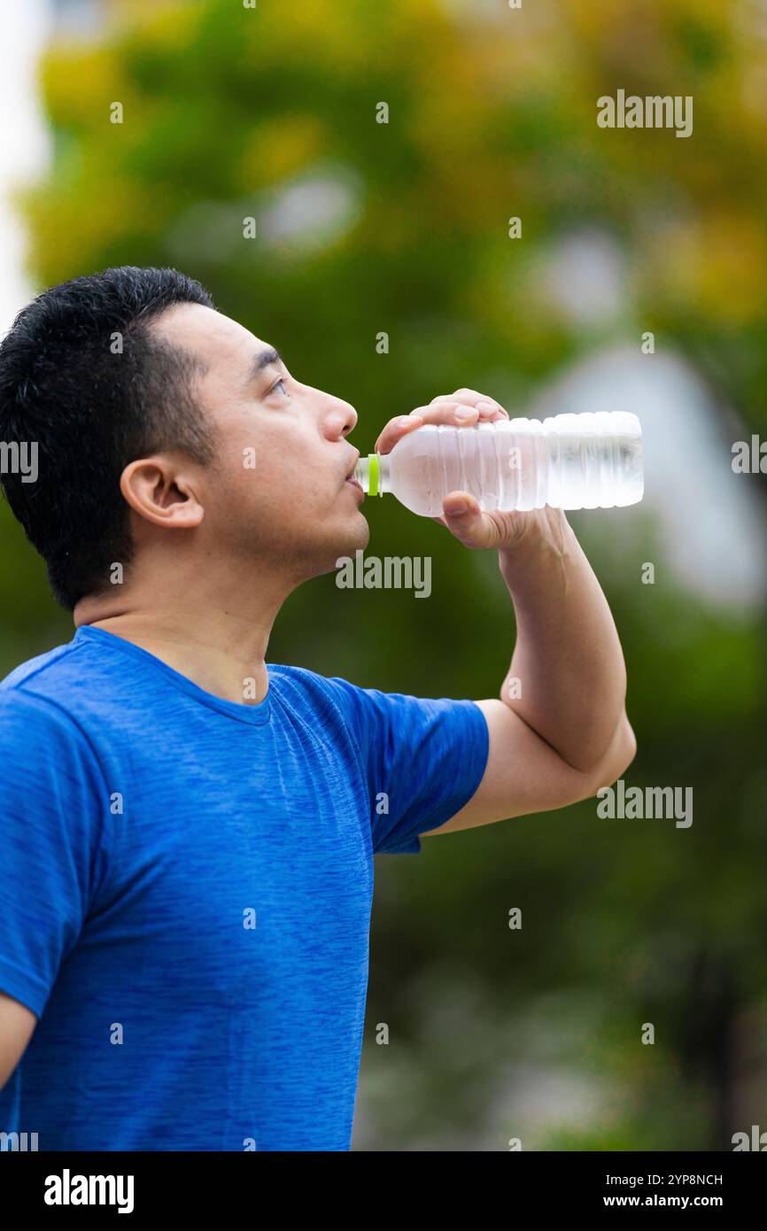Man drinking water Stock Photo - Alamy