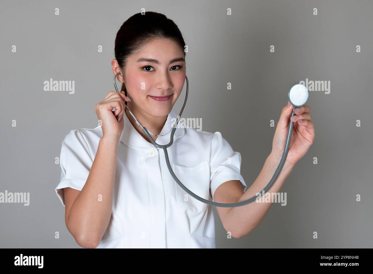 Woman in nurse's uniform Stock Photo - Alamy