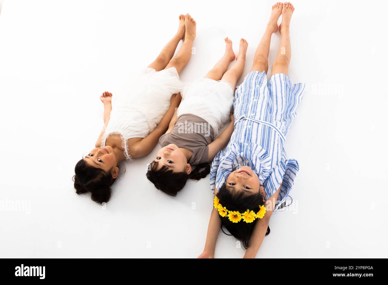 Girl lying down Stock Photo - Alamy