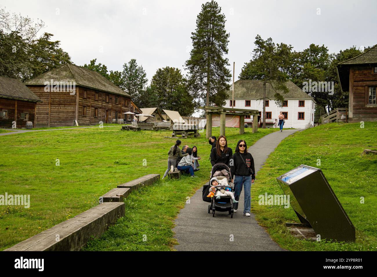 Visitors explore the buildings at Fort Langley (1827), a fur trading ...