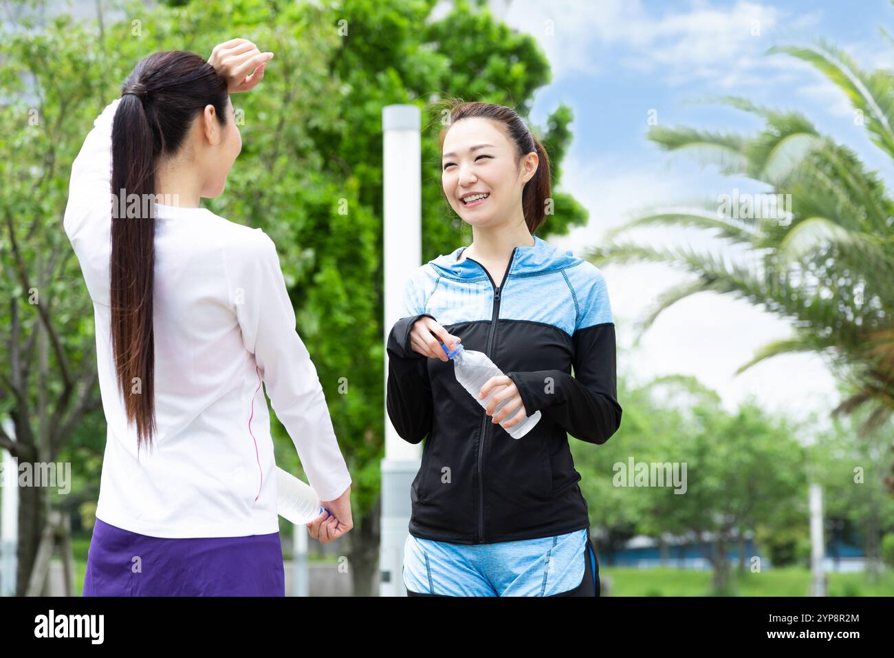 Two women taking a break Stock Photo - Alamy