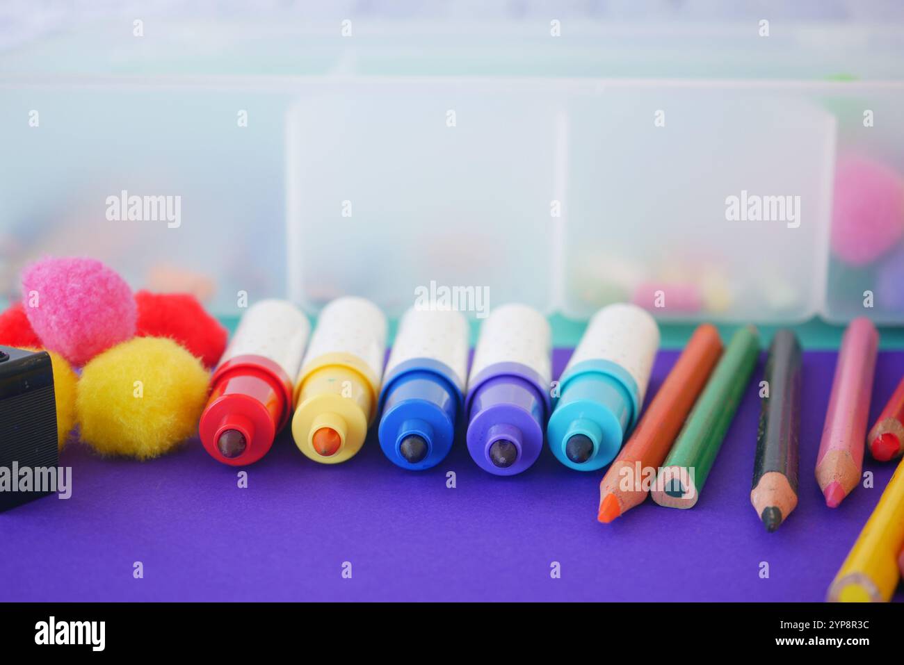 Vibrant and Colorful Art Supplies Perfectly Arranged on a Purple ...