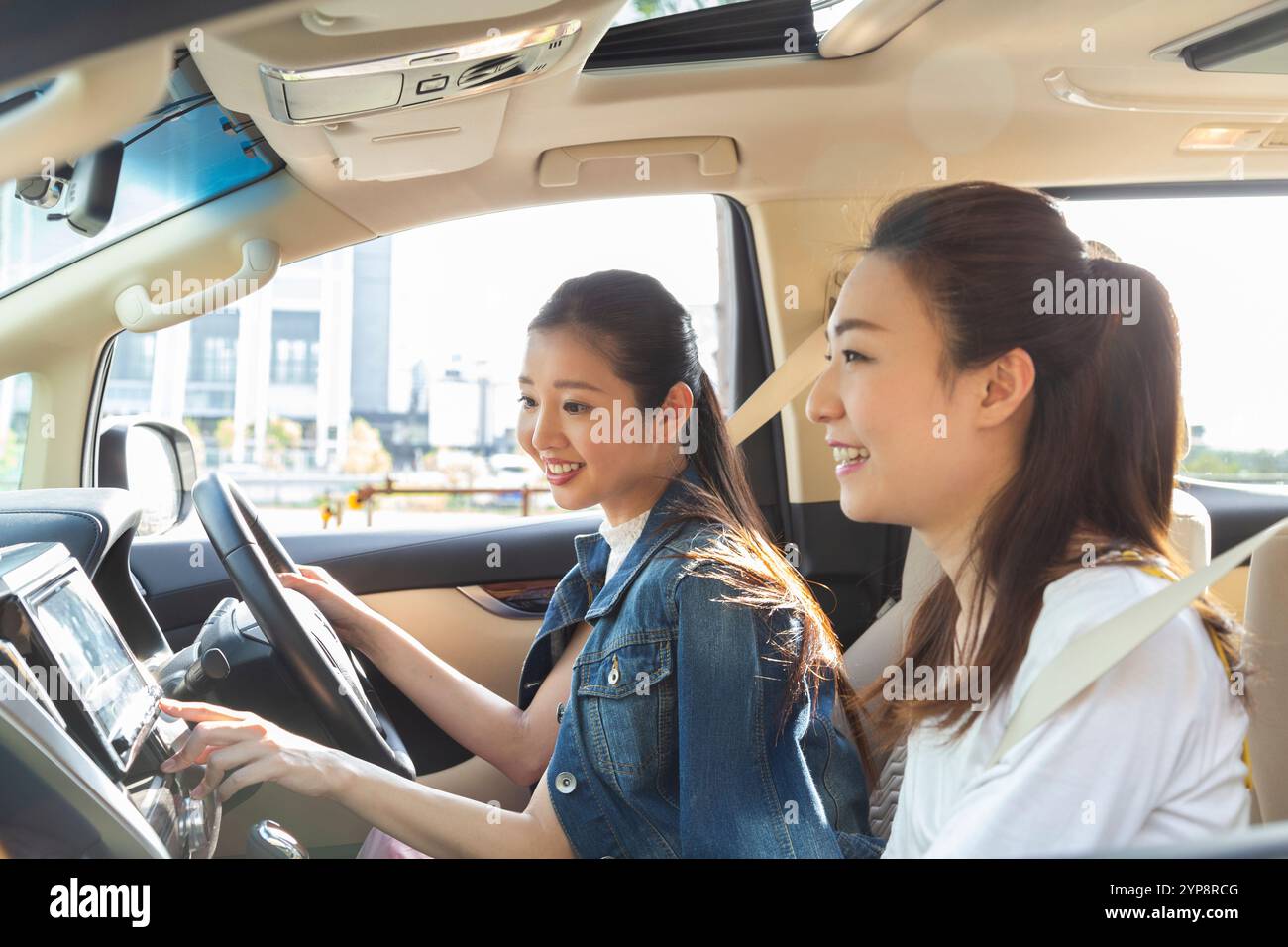 Woman touching car navigation system Stock Photo - Alamy