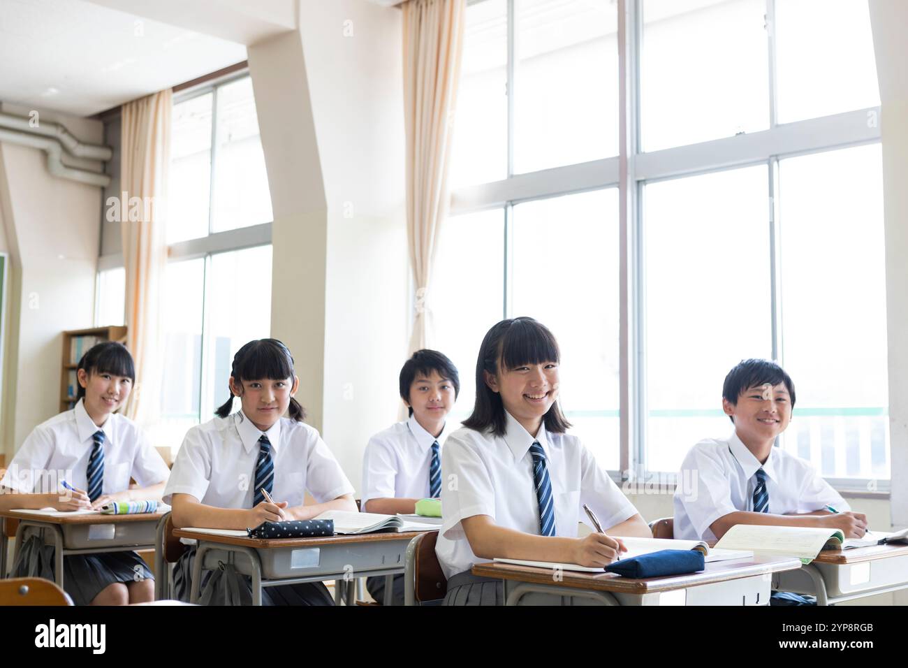 Junior high school students in class Stock Photo - Alamy