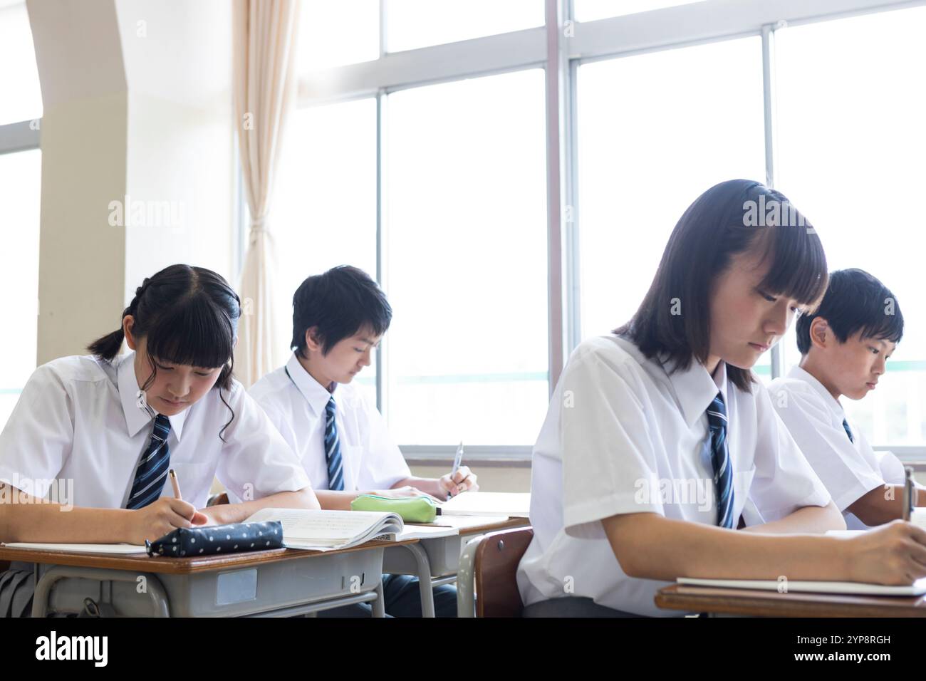 Junior high school students in class Stock Photo - Alamy
