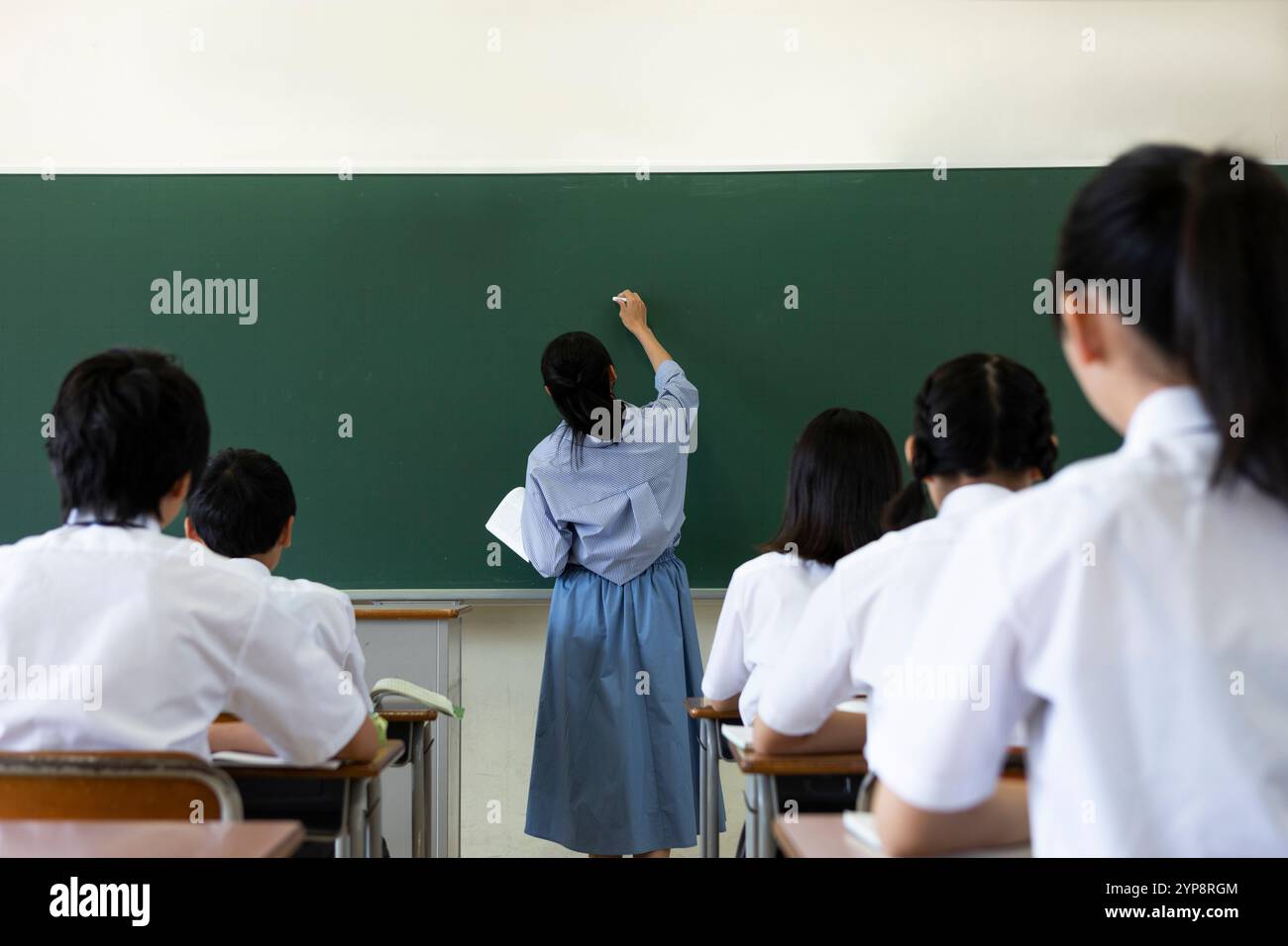 Middle school classroom back view hi-res stock photography and images ...