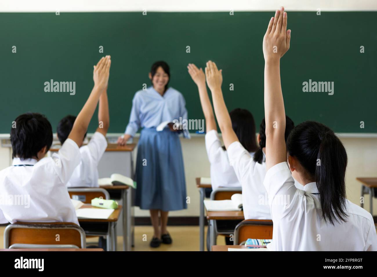 Middle school classroom back view hi-res stock photography and images ...