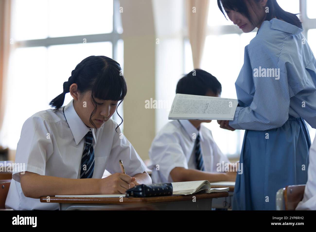 Junior high school students in class Stock Photo - Alamy
