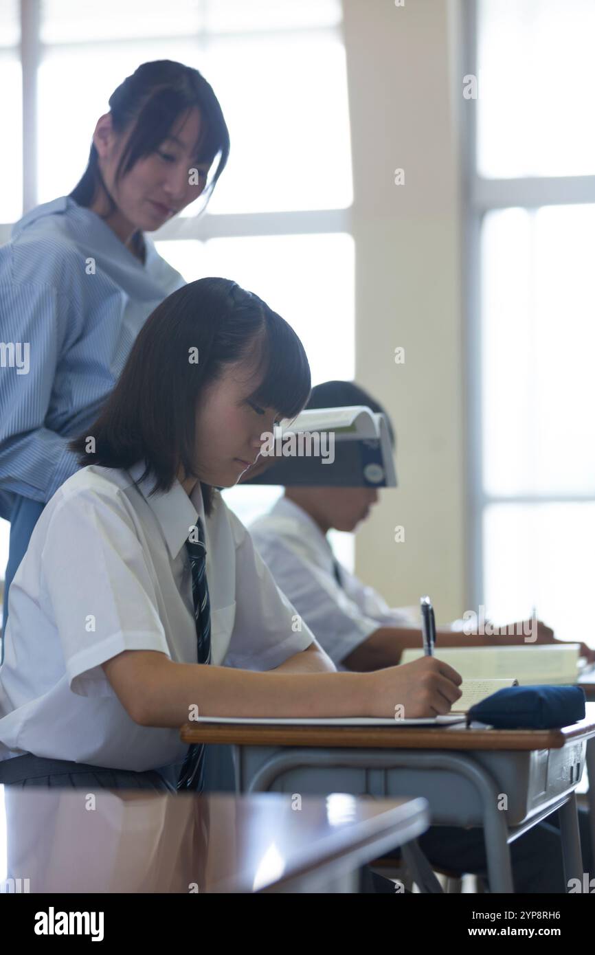 Junior high school students in class Stock Photo - Alamy