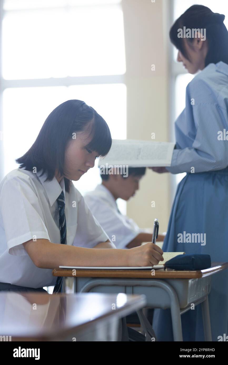 Woman boy note school hi-res stock photography and images - Alamy