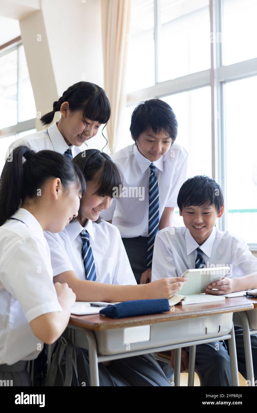 Junior high school students in class Stock Photo - Alamy