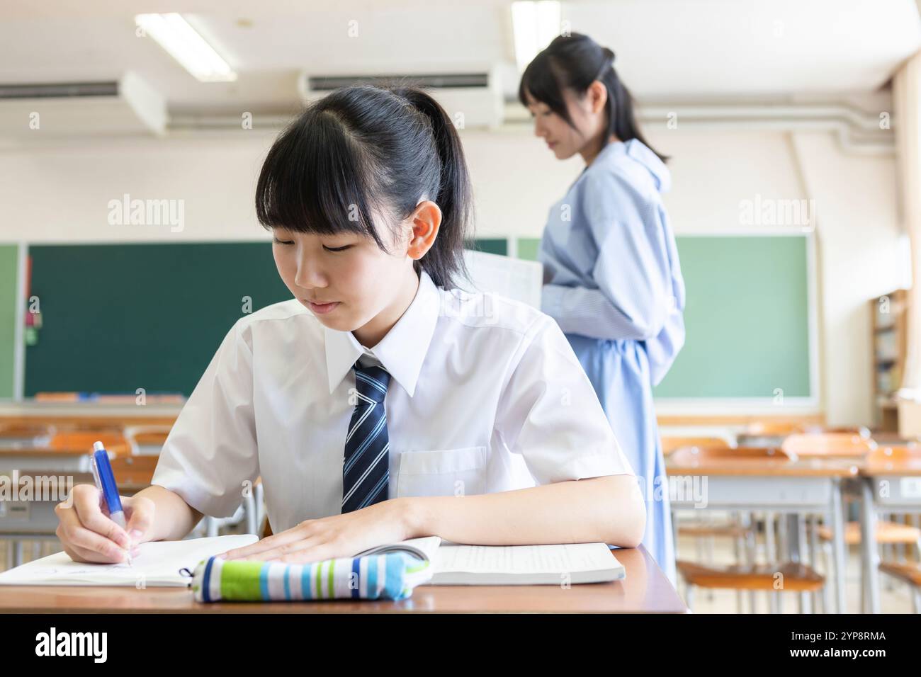 Middle school students teacher in hi-res stock photography and images ...