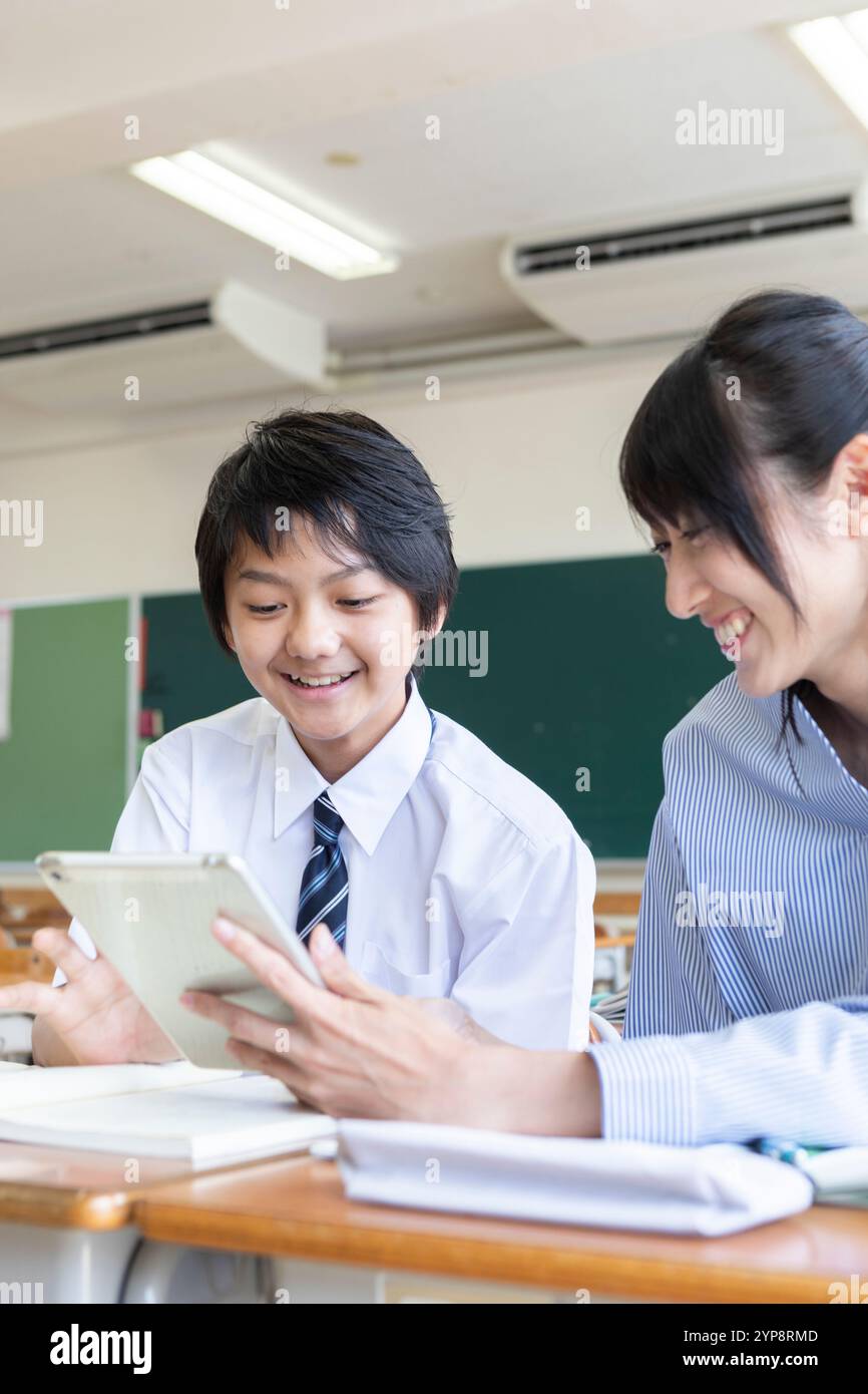 Junior high school students in class Stock Photo - Alamy