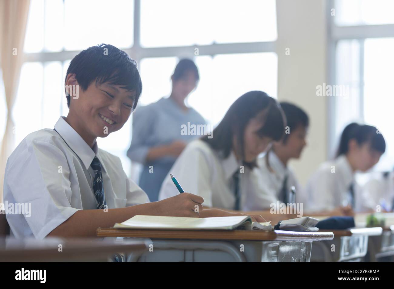 Junior high school students in class Stock Photo - Alamy