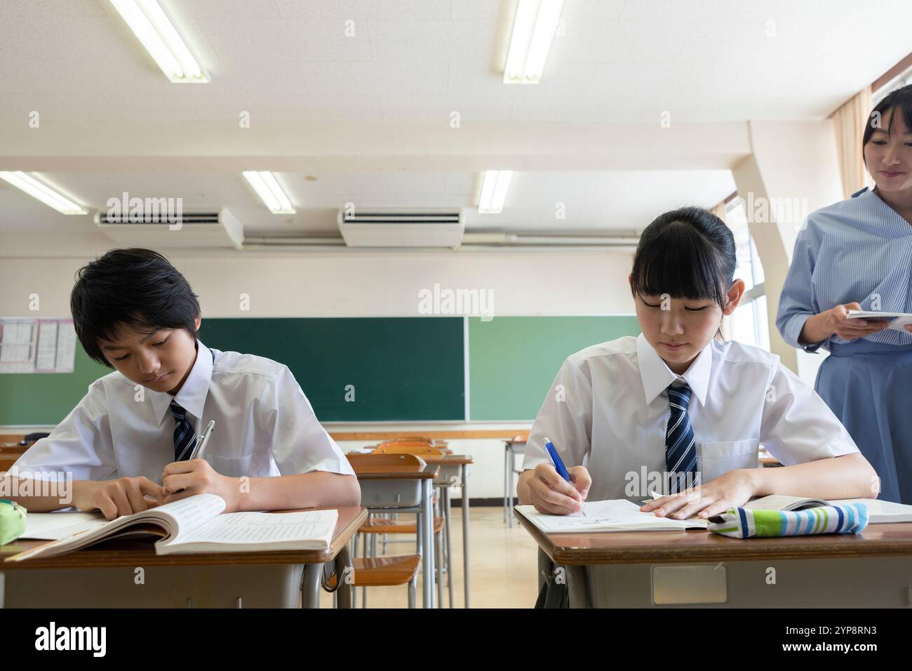 Junior high school students in class Stock Photo - Alamy