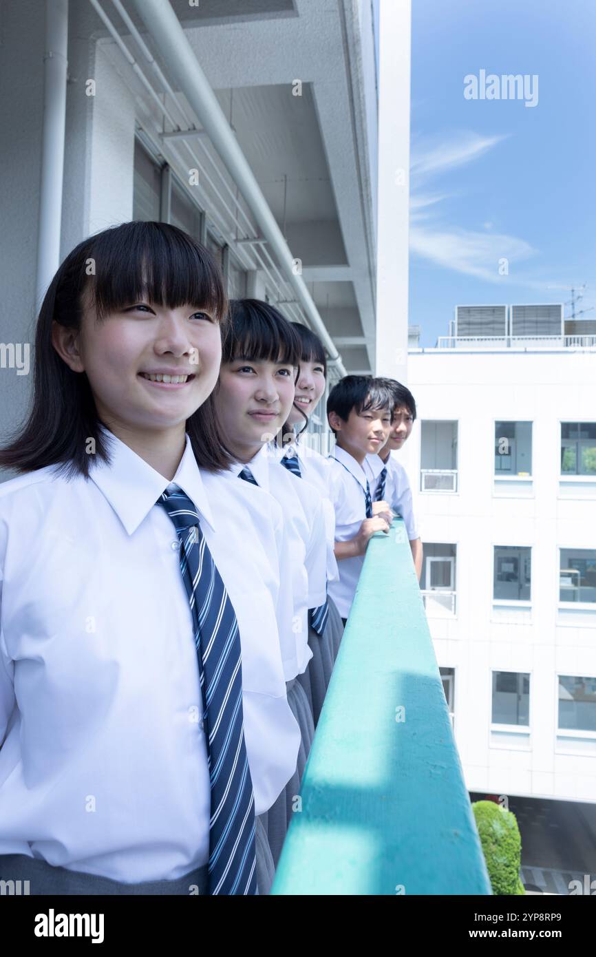 Secondary school children lined up on balcony Stock Photo - Alamy