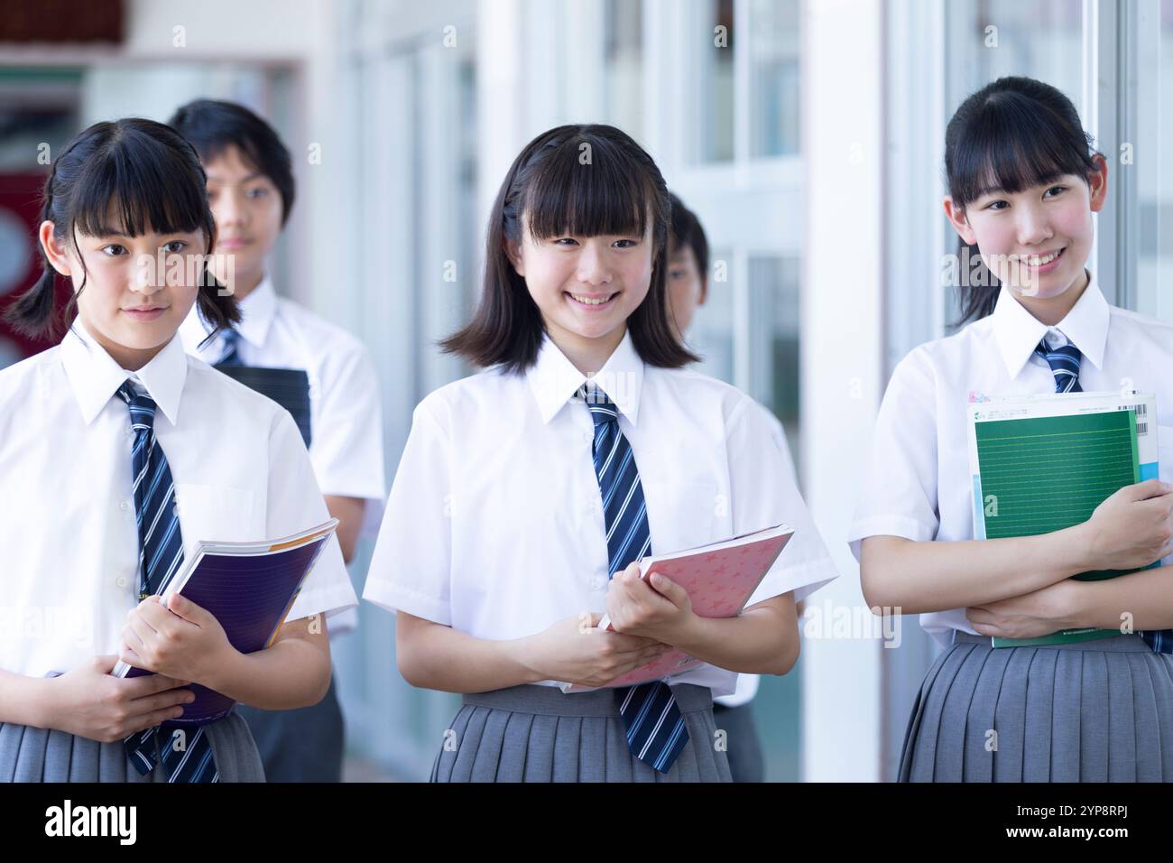 Secondary school students lined up in corridor Stock Photo - Alamy