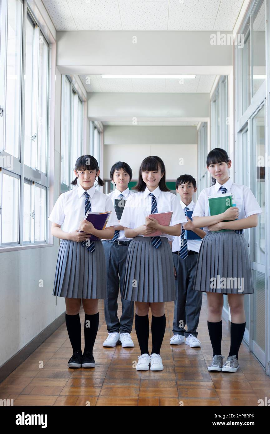 Secondary school students lined up in corridor Stock Photo - Alamy