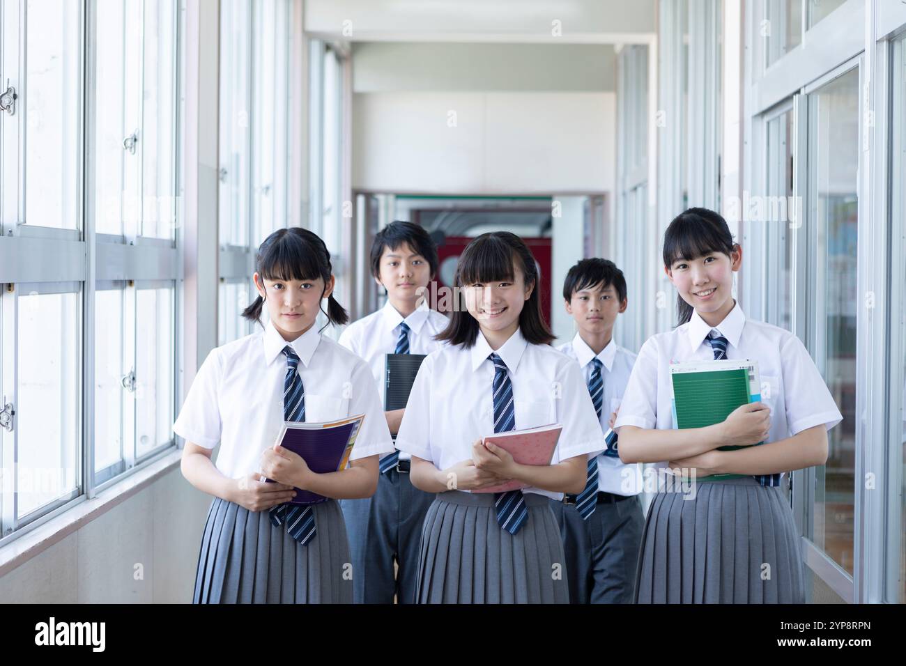 Secondary school students lined up in corridor Stock Photo - Alamy