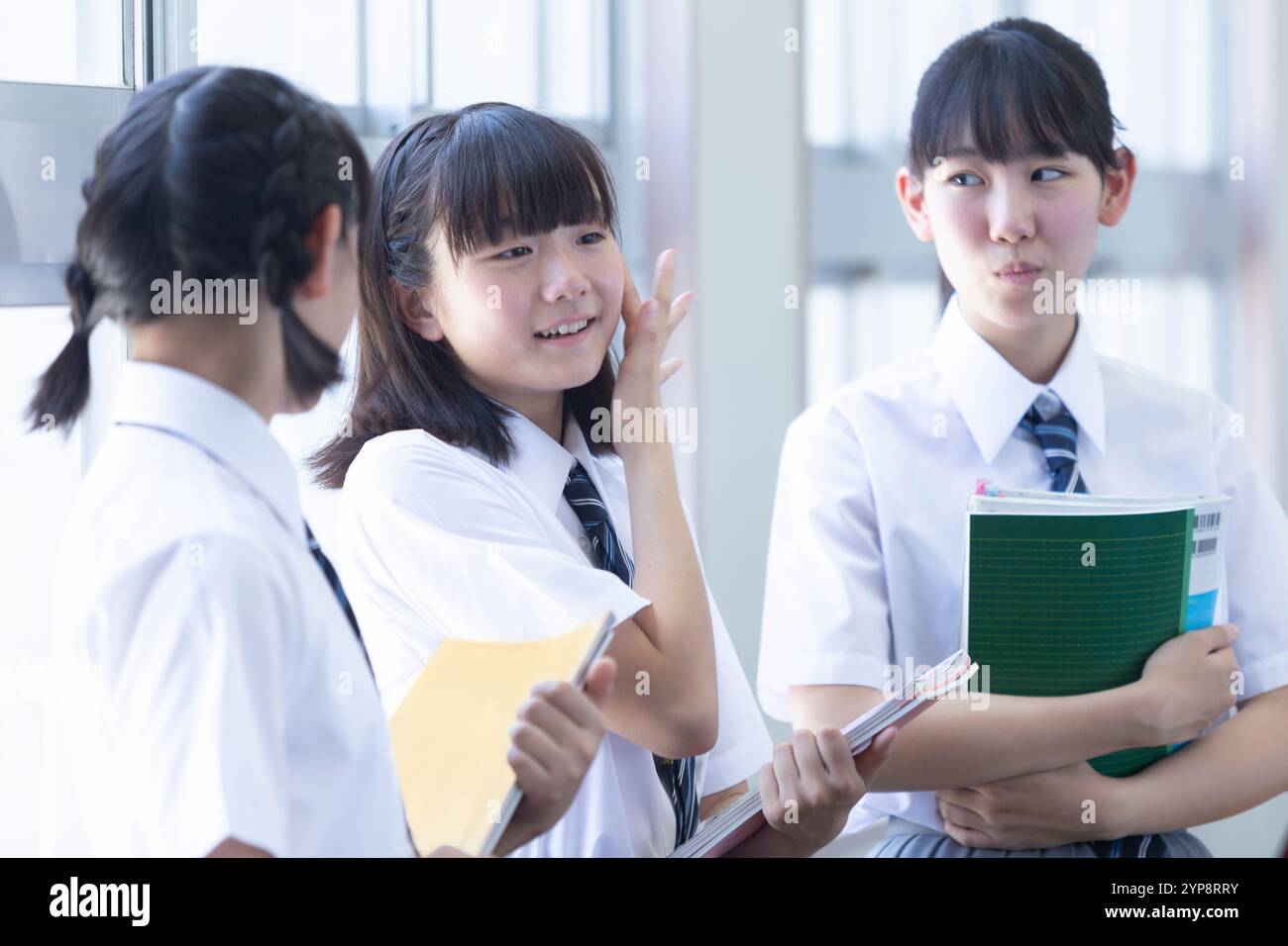 School girls chatting uniform hi-res stock photography and images - Alamy