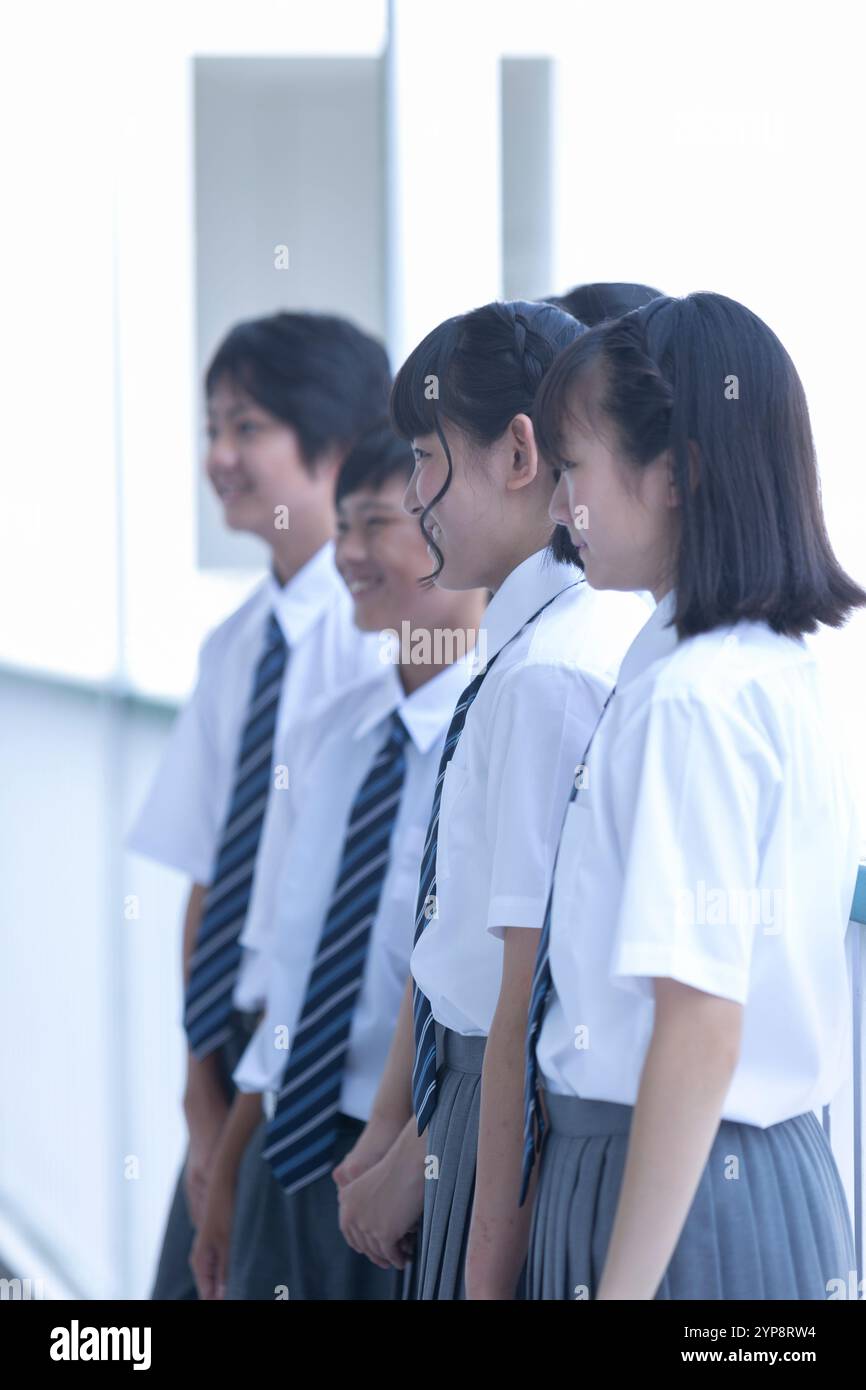 Secondary school children lined up on balcony Stock Photo - Alamy