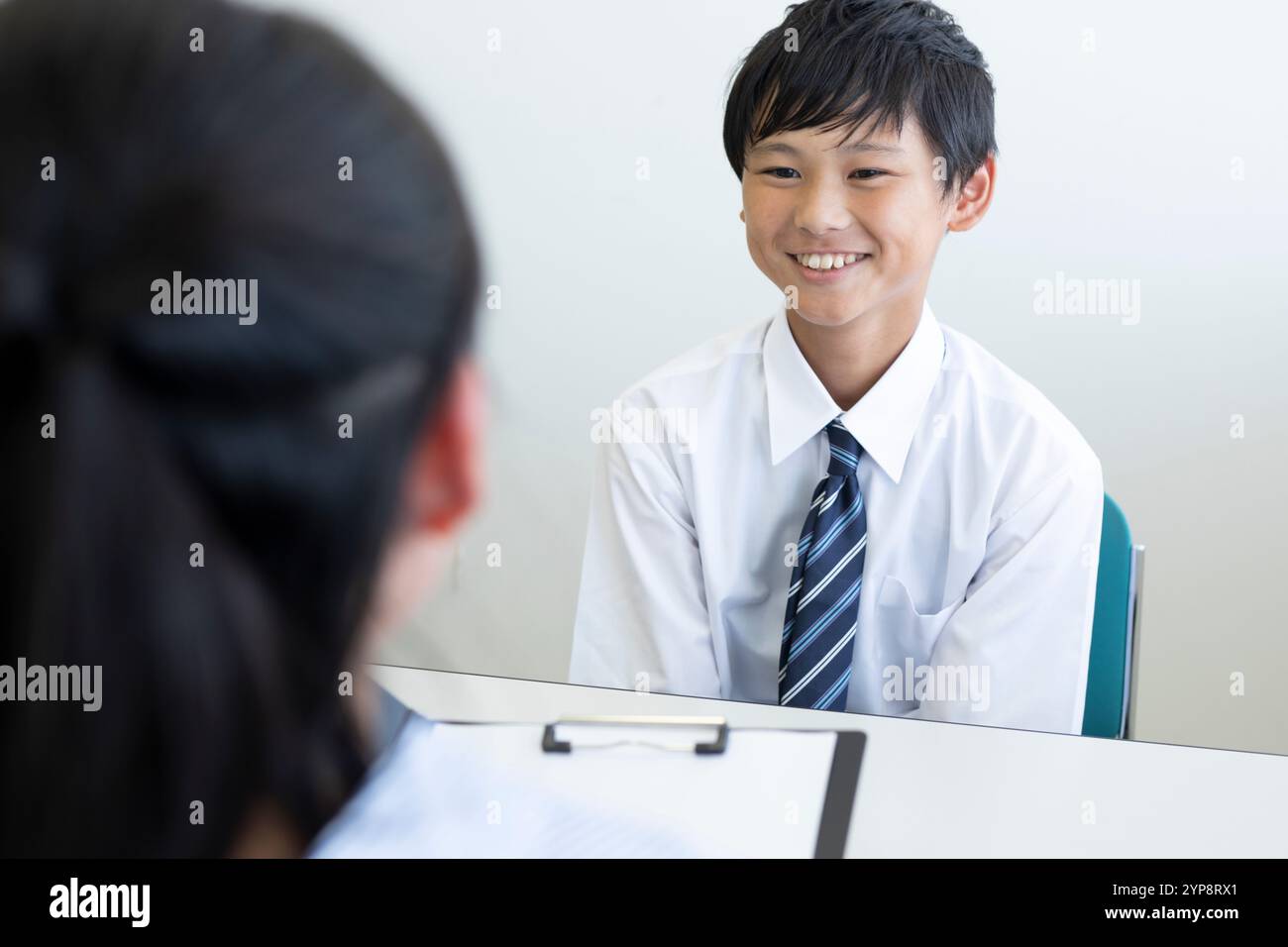 Junior high school student during interview Stock Photo - Alamy