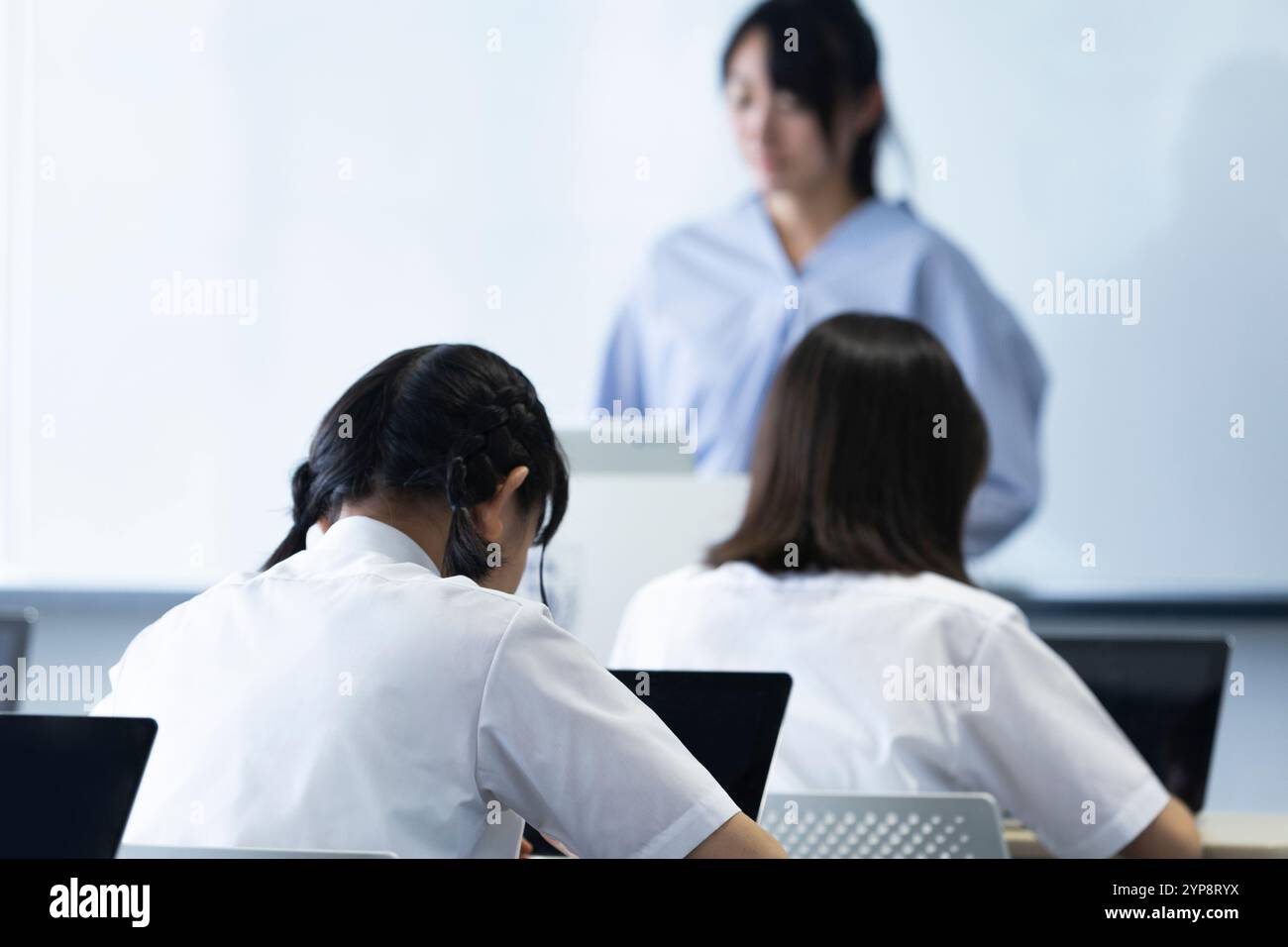 Junior high school pupils in class Stock Photo - Alamy