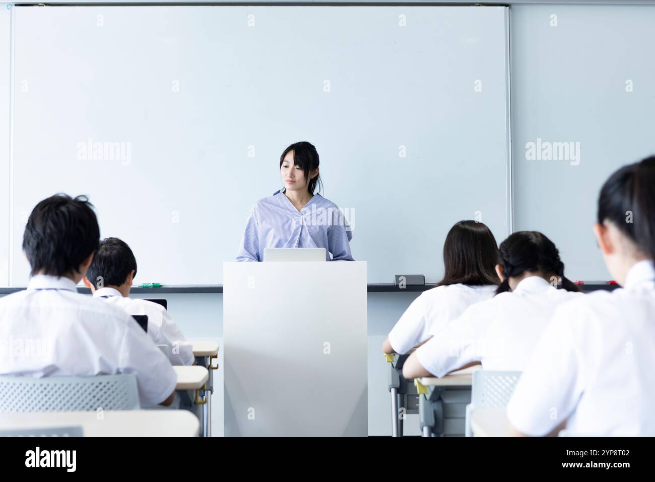 Junior high school pupils in class Stock Photo - Alamy