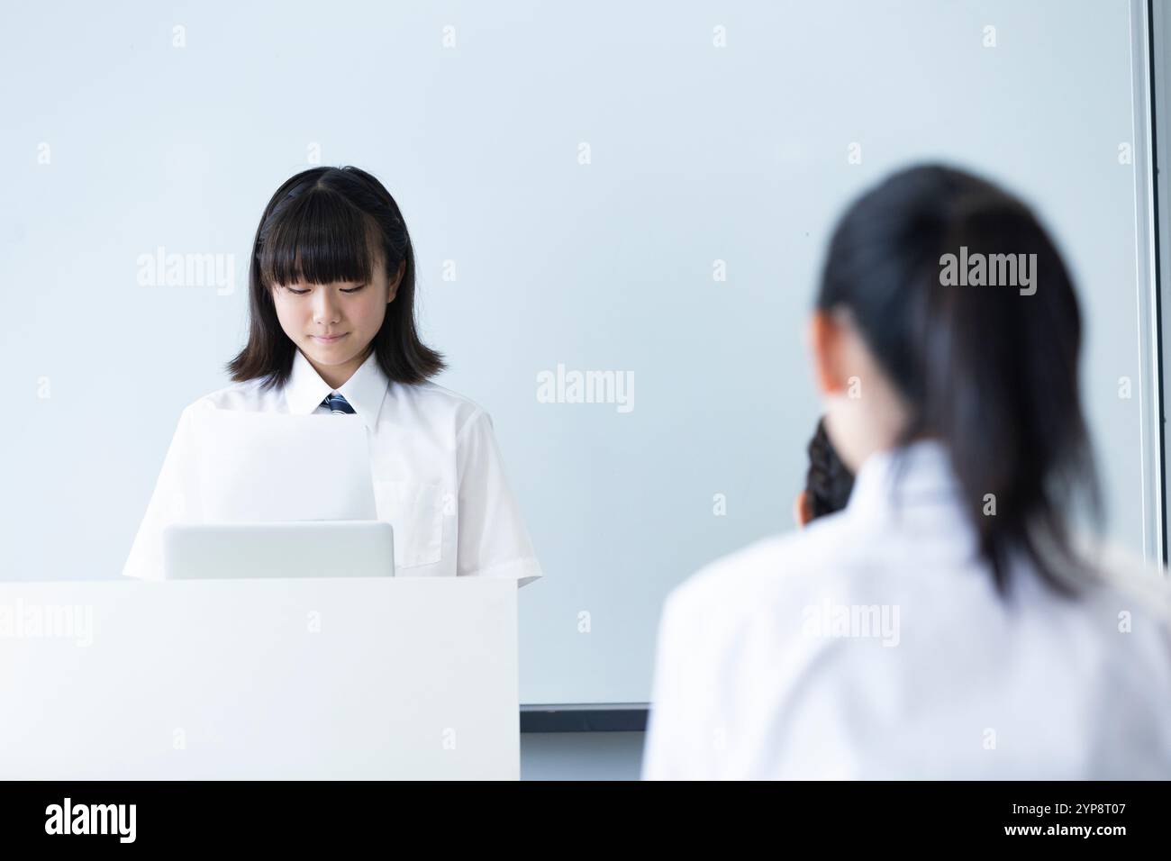 Junior high school pupils in class Stock Photo - Alamy