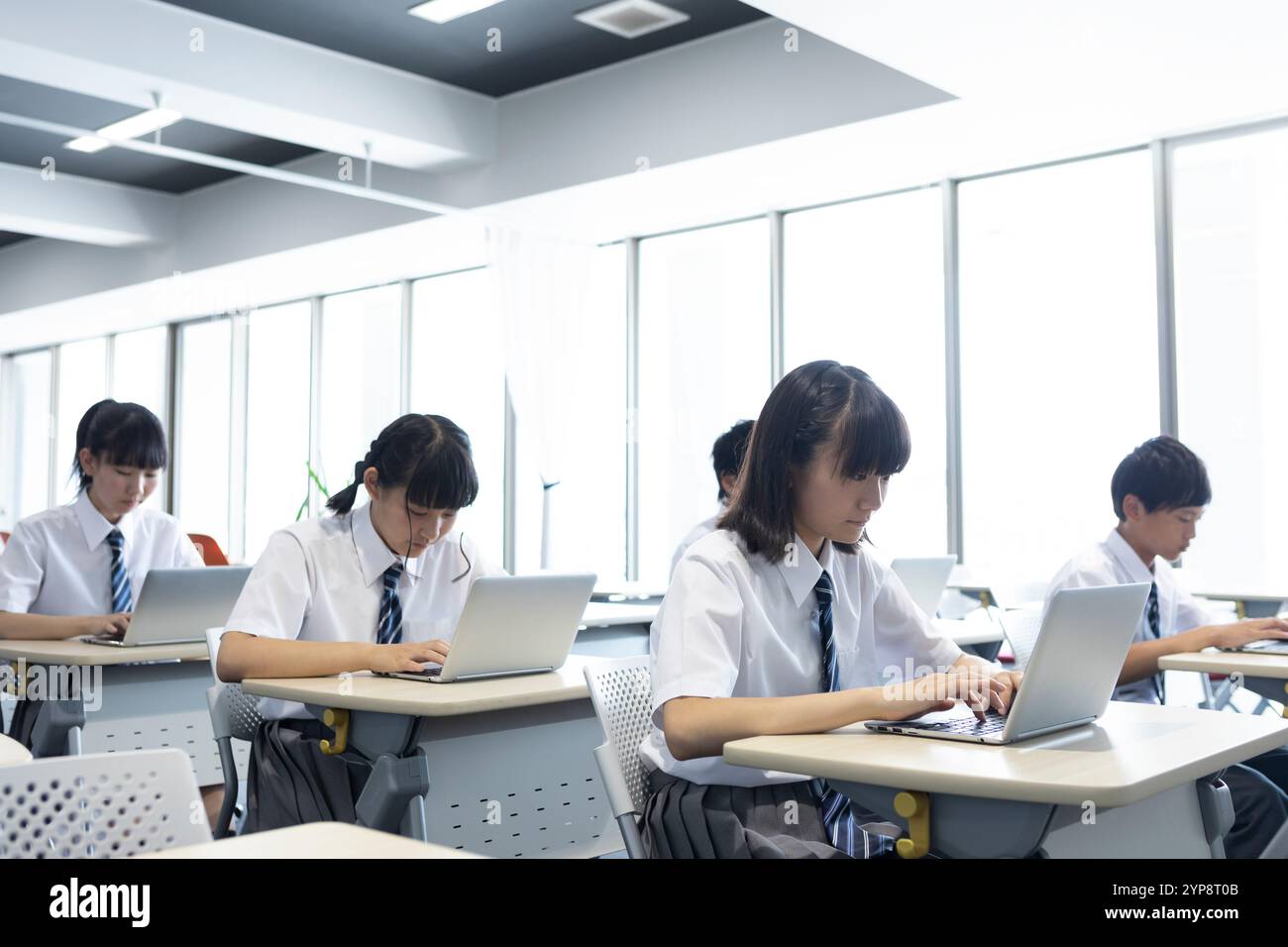 Junior high school pupils in class Stock Photo - Alamy