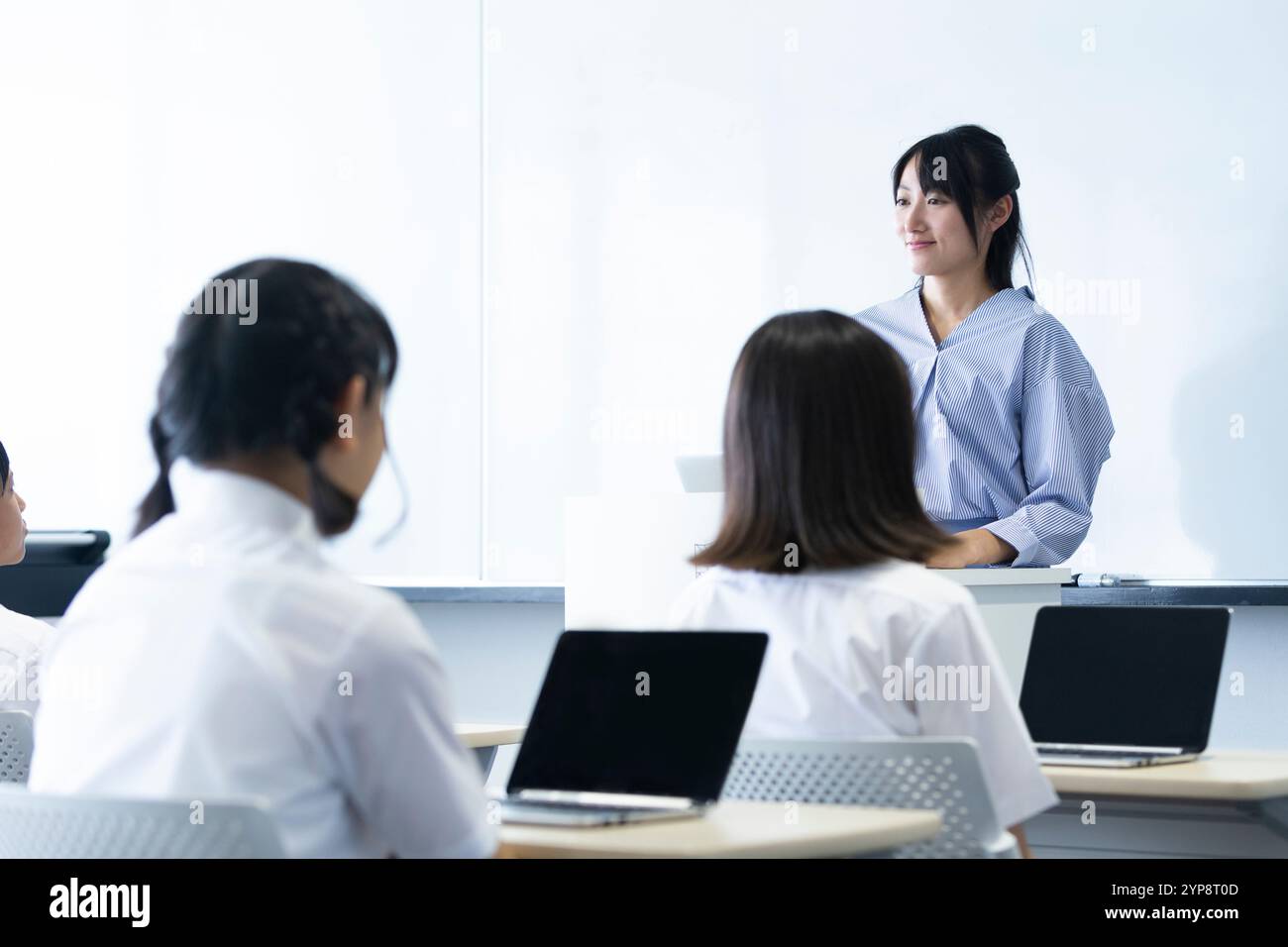 Junior high school pupils in class Stock Photo - Alamy