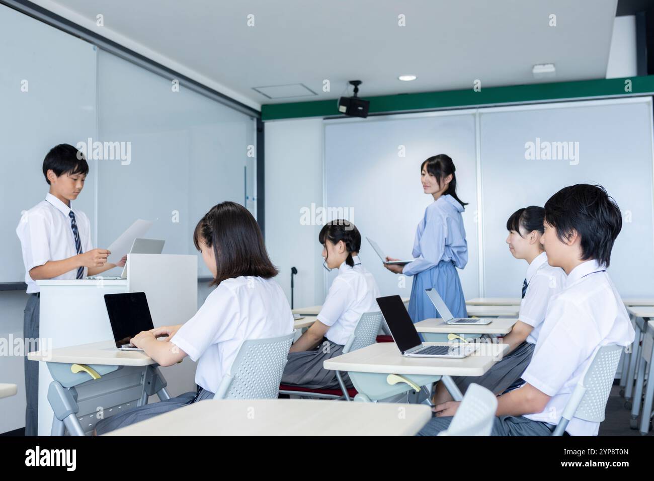 Junior high school pupils in class Stock Photo - Alamy