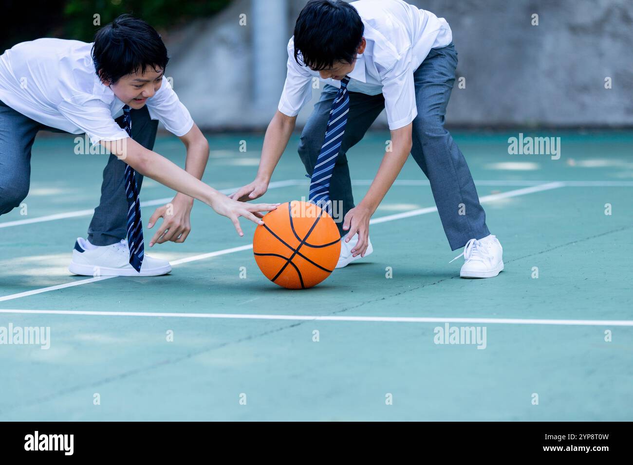 Secondary school students playing basketball Stock Photo - Alamy