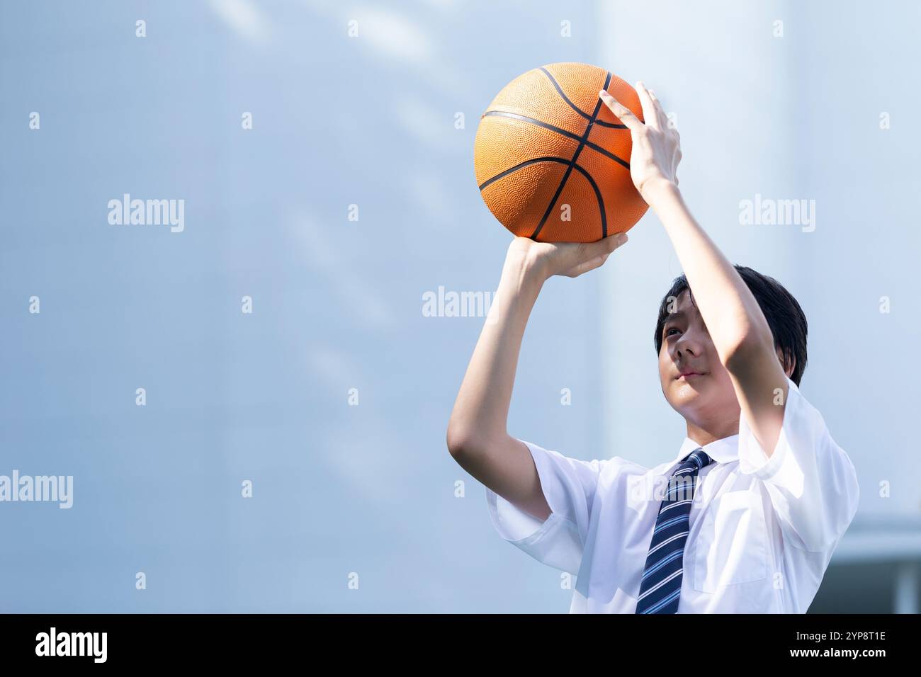 Secondary school students playing basketball Stock Photo - Alamy