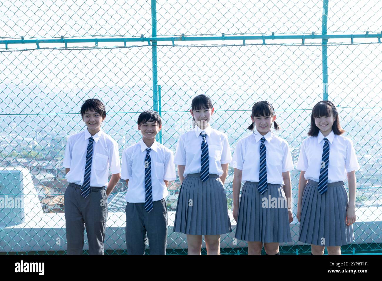 Junior high school students on rooftop Stock Photo - Alamy