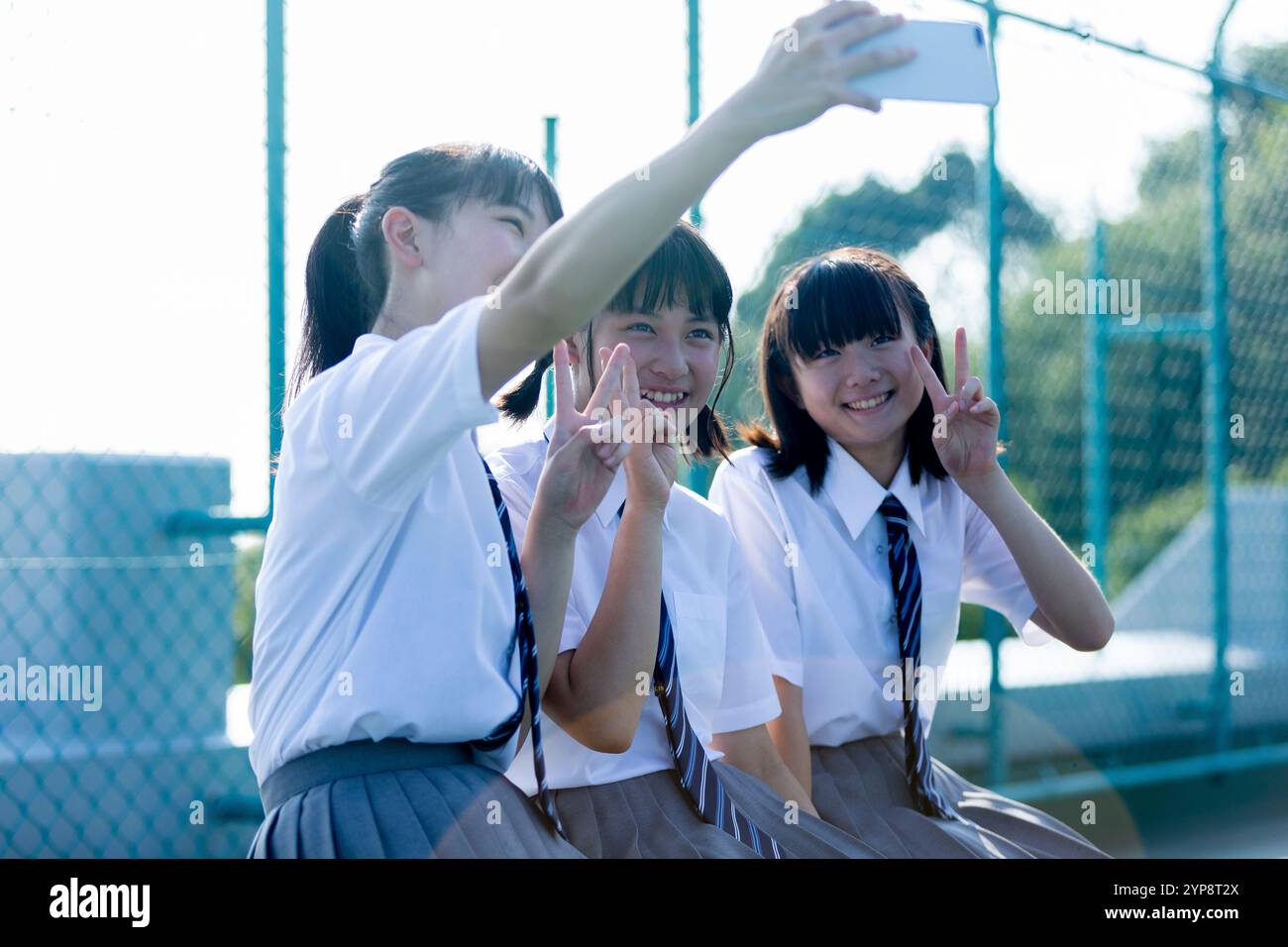 Junior high school students on rooftop Stock Photo - Alamy