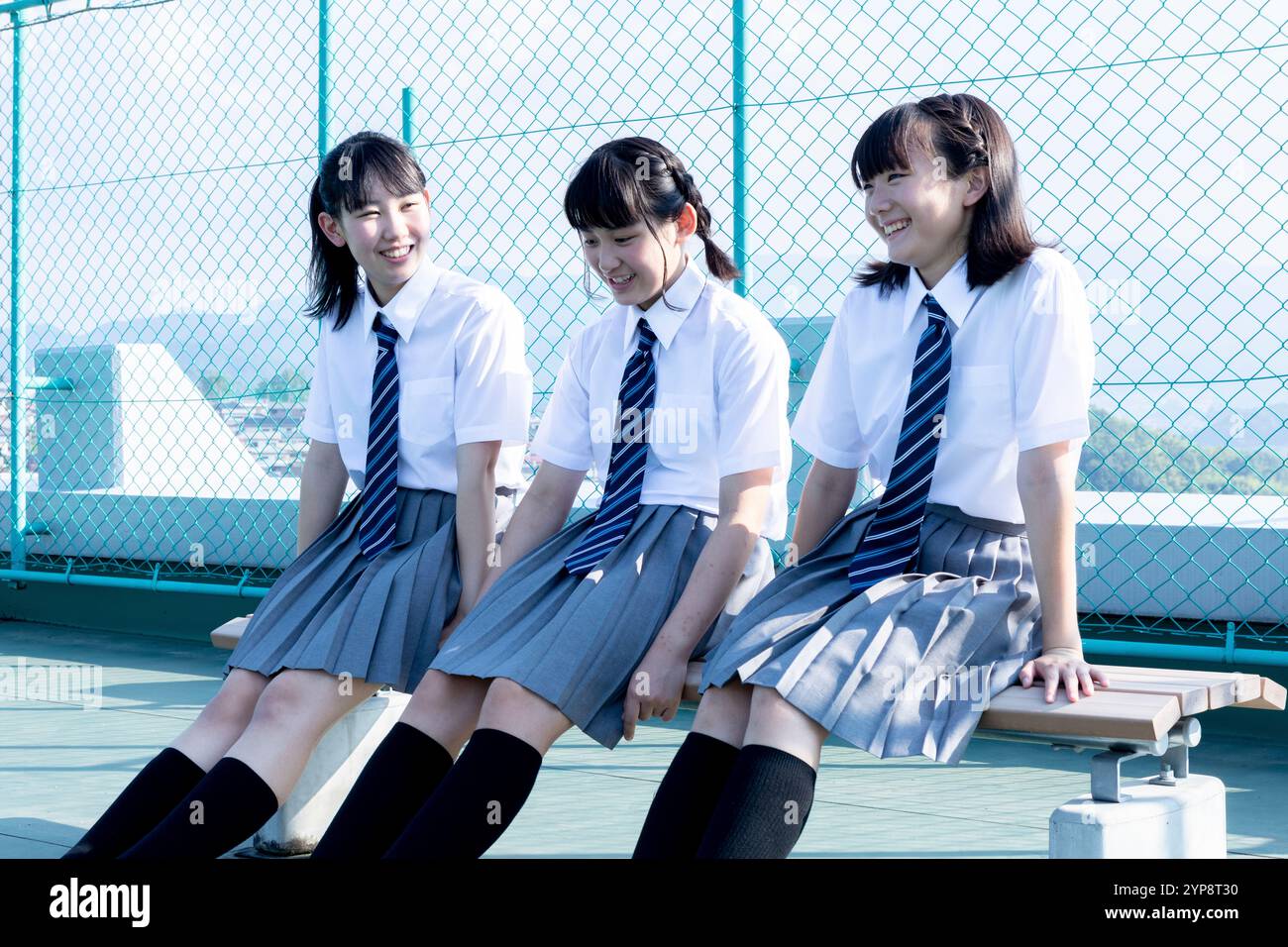 Junior high school students on rooftop Stock Photo - Alamy