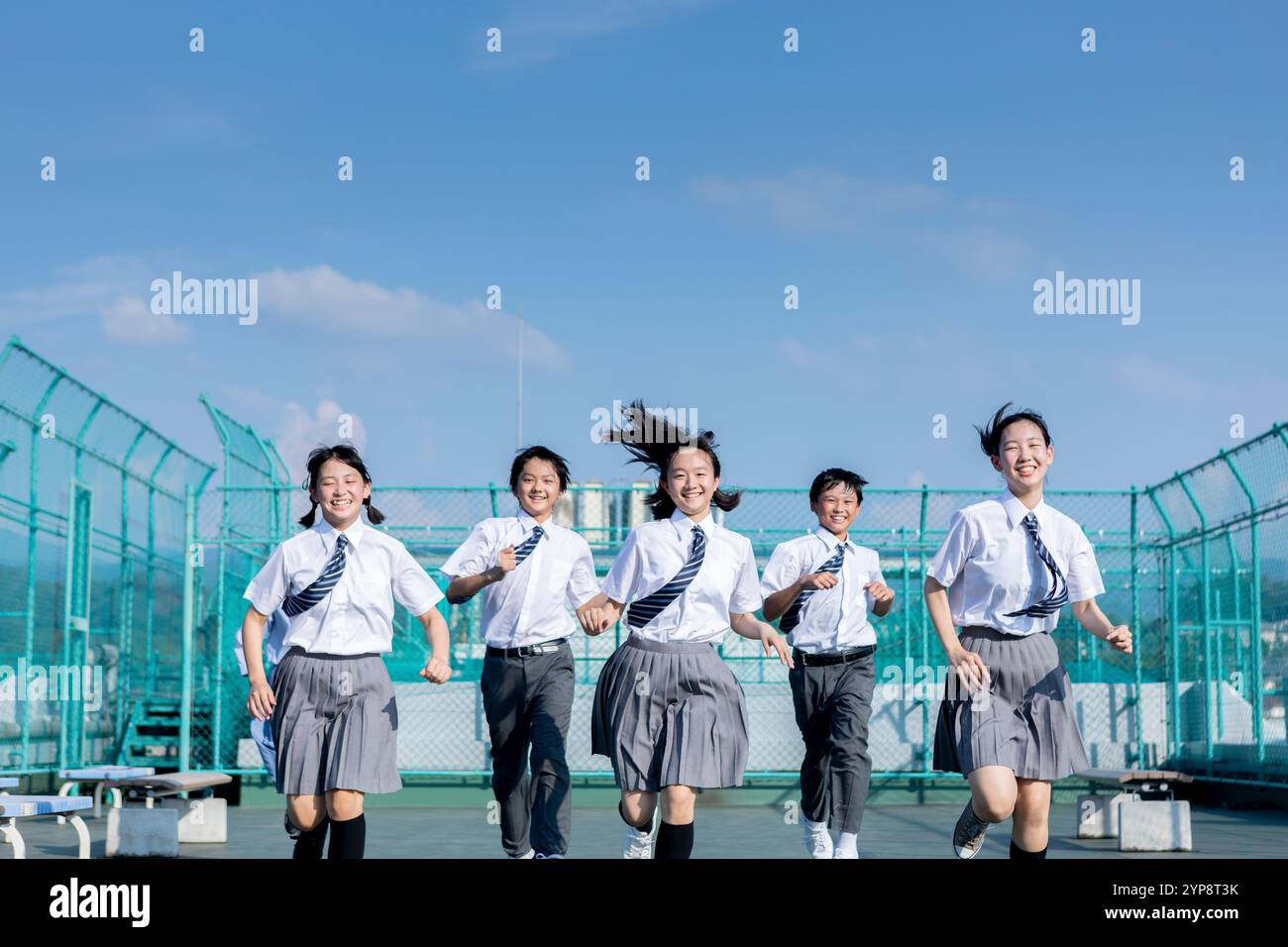 Junior high school students on rooftop Stock Photo - Alamy