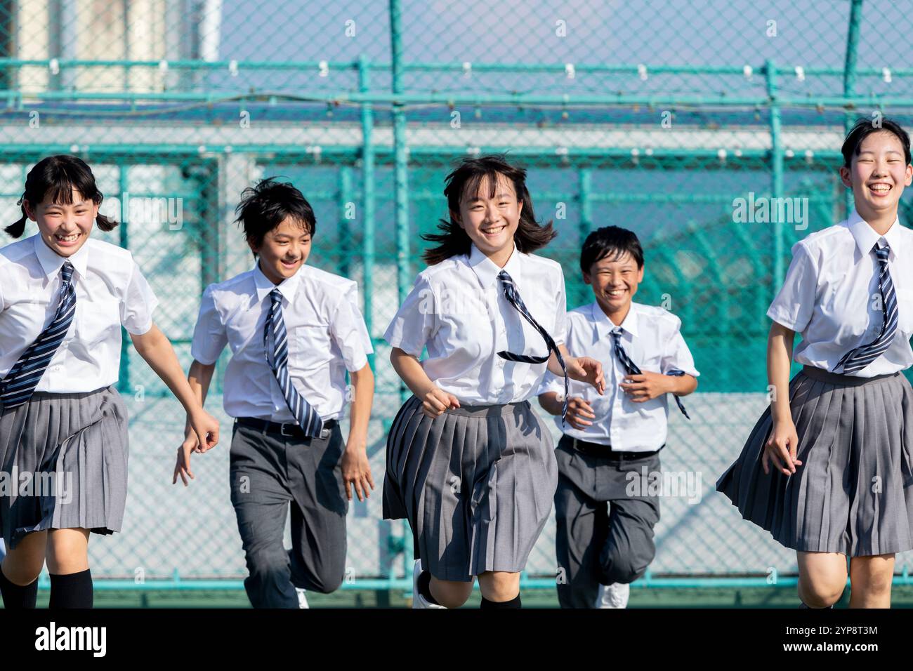 Junior high school students on rooftop Stock Photo - Alamy