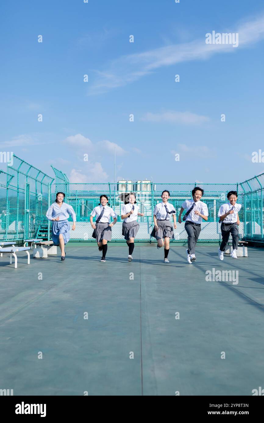 Junior high school students on rooftop Stock Photo - Alamy