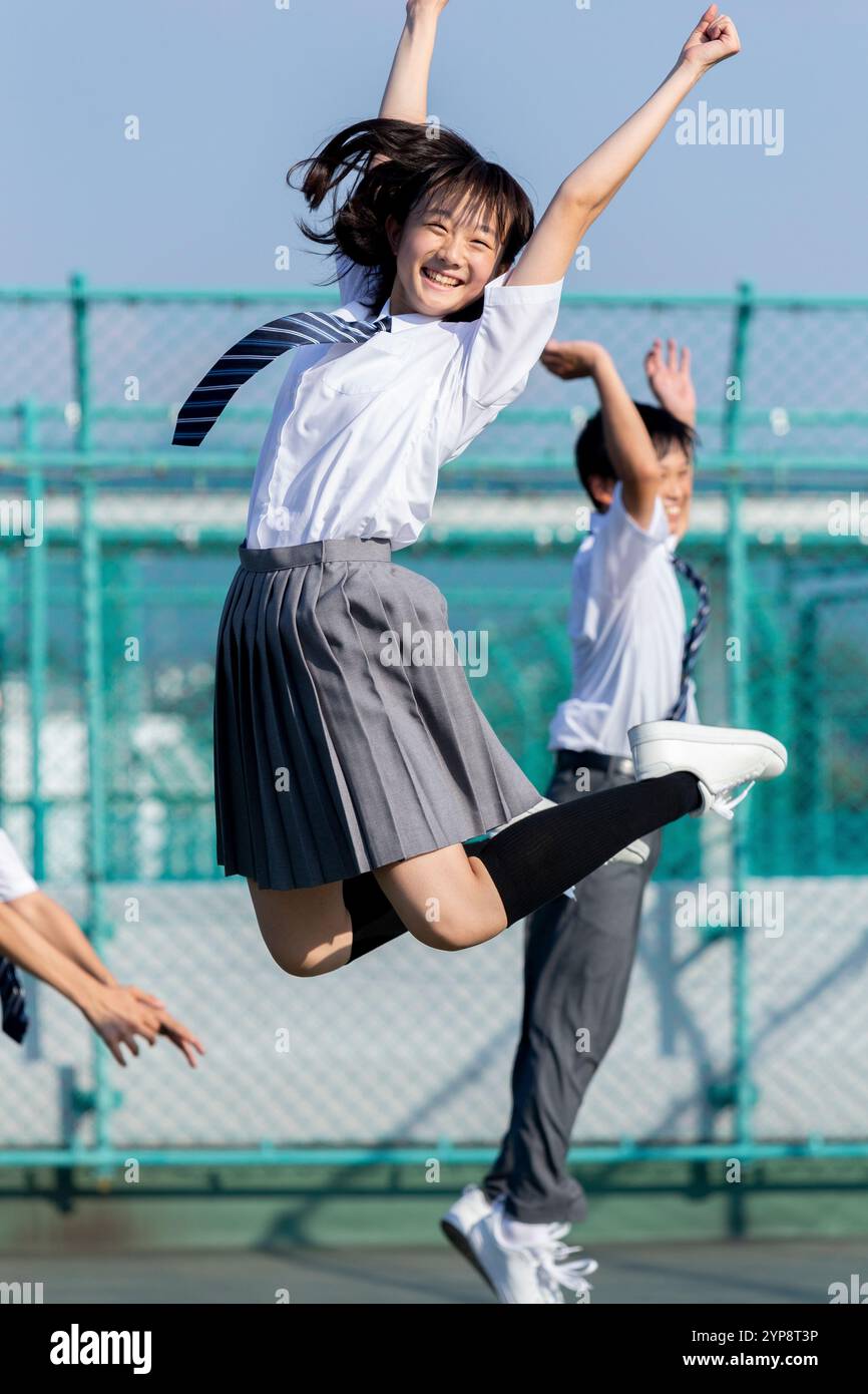 Junior high school students on rooftop Stock Photo - Alamy