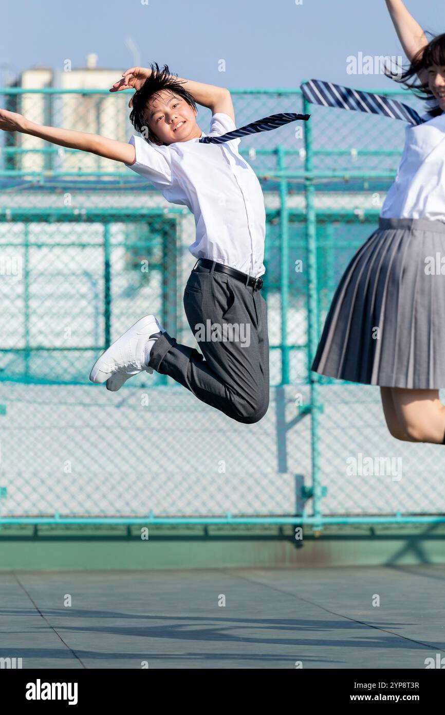 Junior high school students on rooftop Stock Photo - Alamy