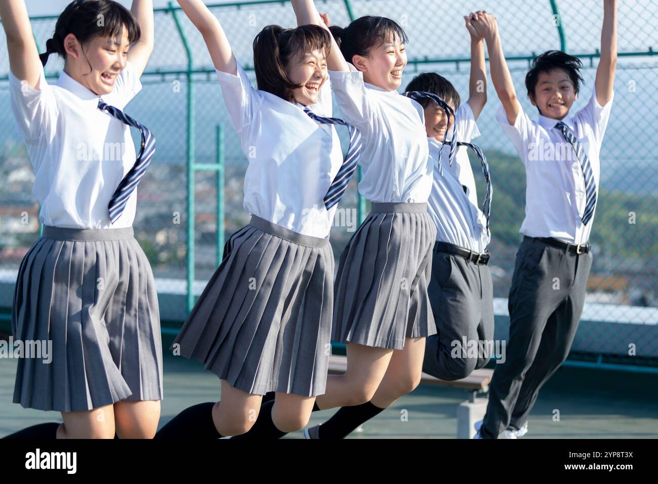 Junior high school students on rooftop Stock Photo - Alamy