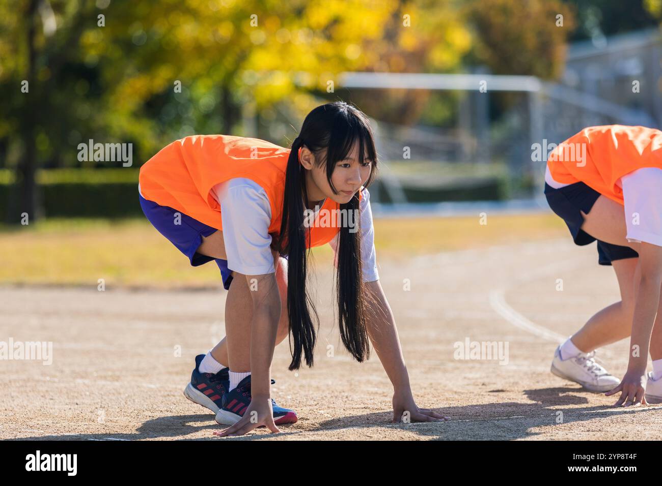 High school students lining up at the start line Stock Photo - Alamy