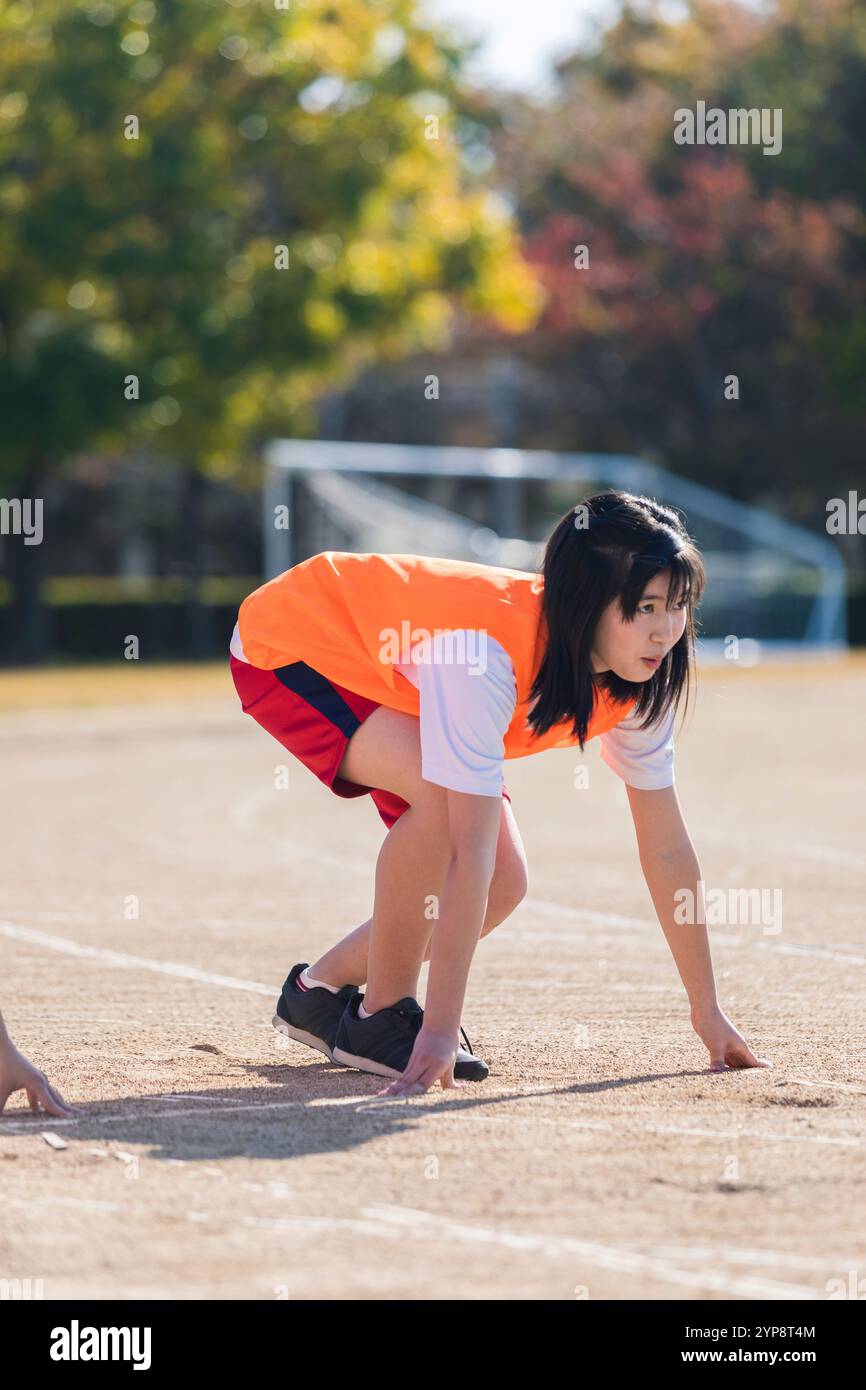 High school students lining up at the start line Stock Photo - Alamy
